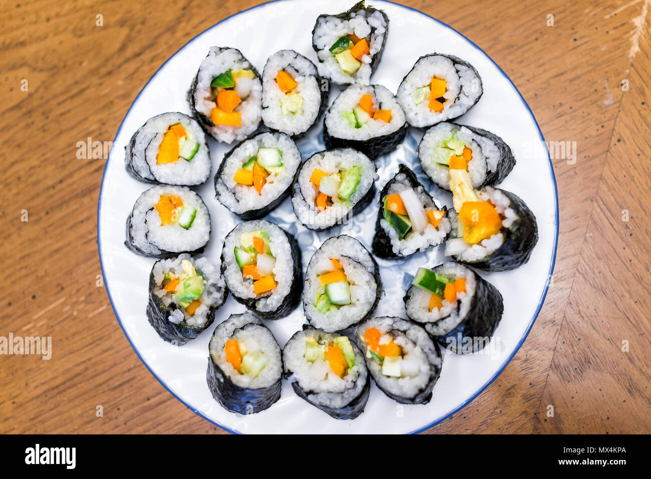 Flat top closeup of handmade homemade maki California vegetable sushi ...