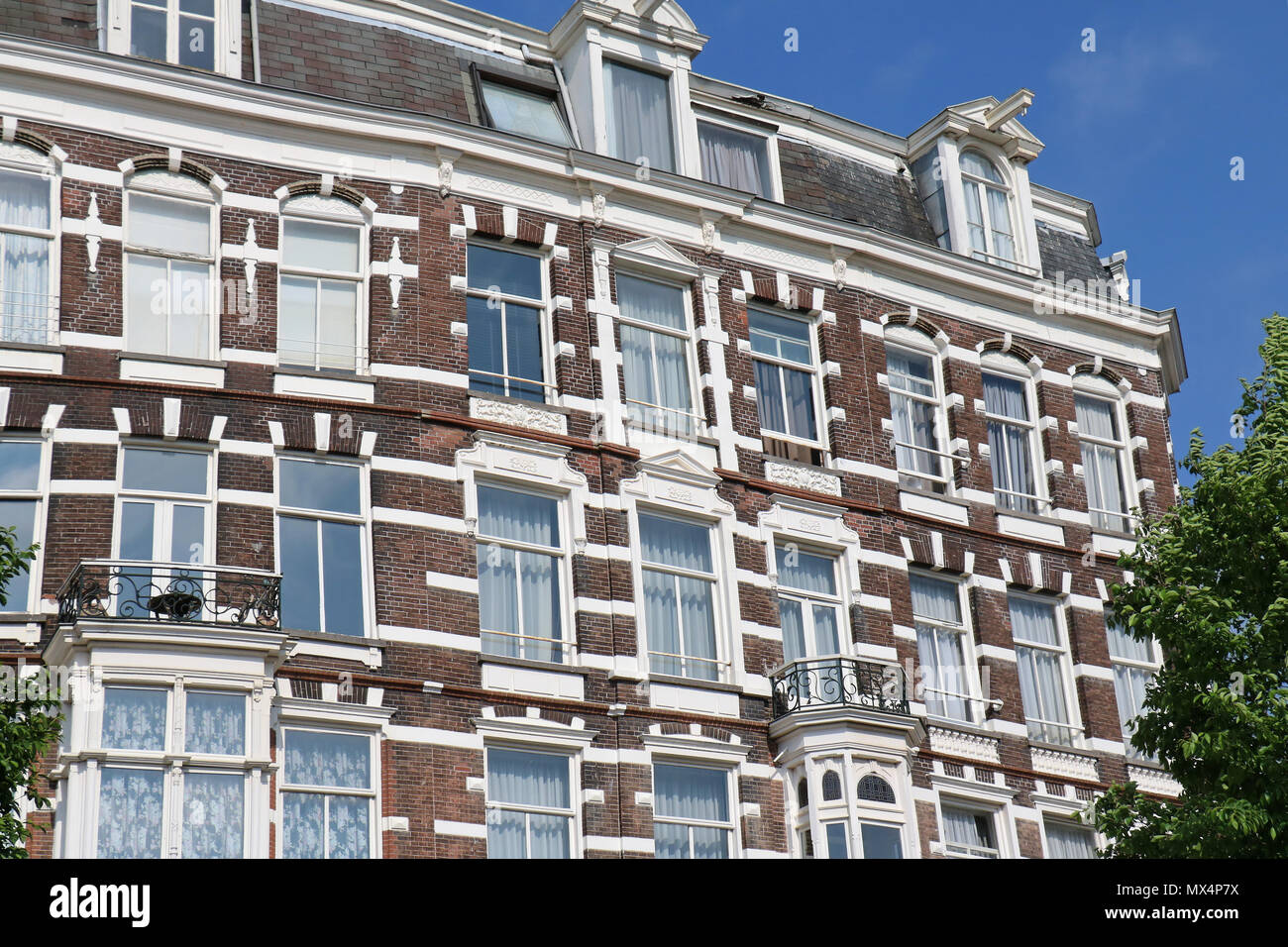 Typical Netherlands buildings architecture facade with tall windows ...