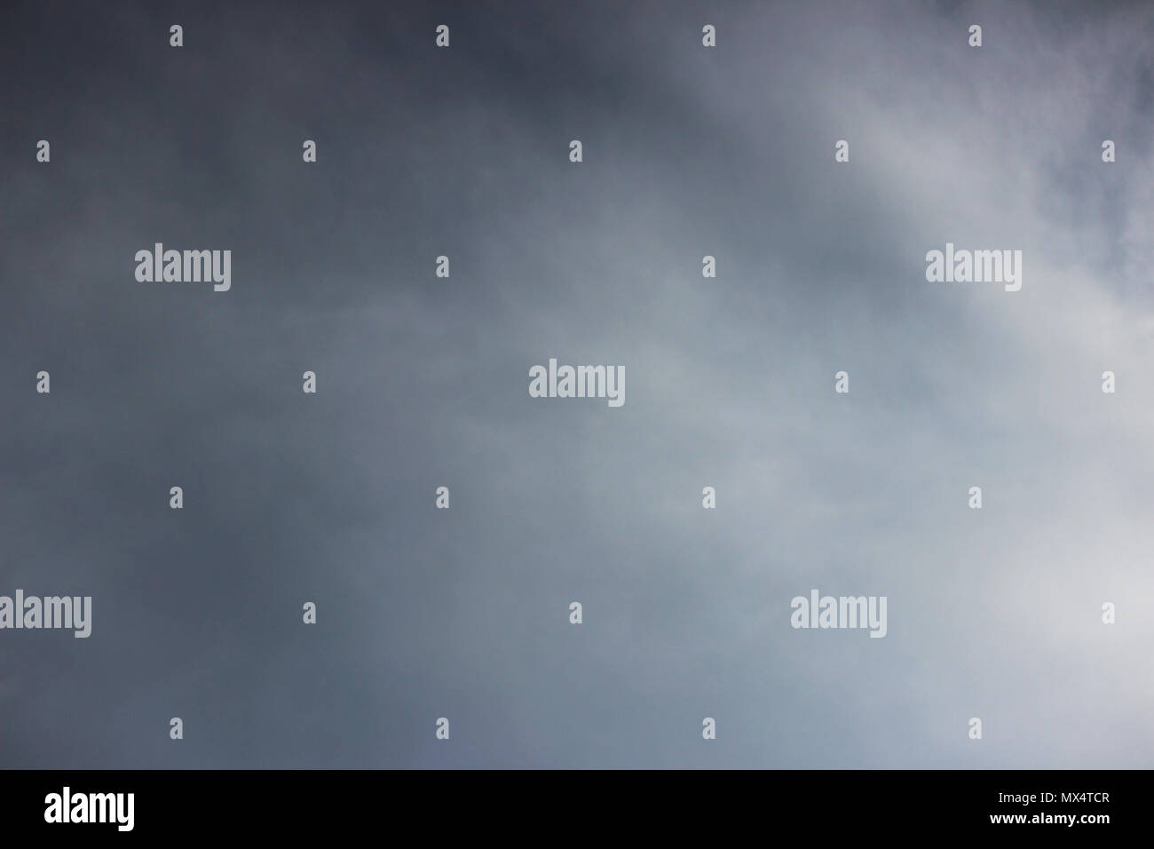 A stormy summer cloud of dark blue color carries a heavy downpour Stock ...