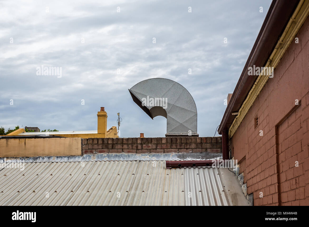 large u shaped ventilation duct on roof top Stock Photo - Alamy