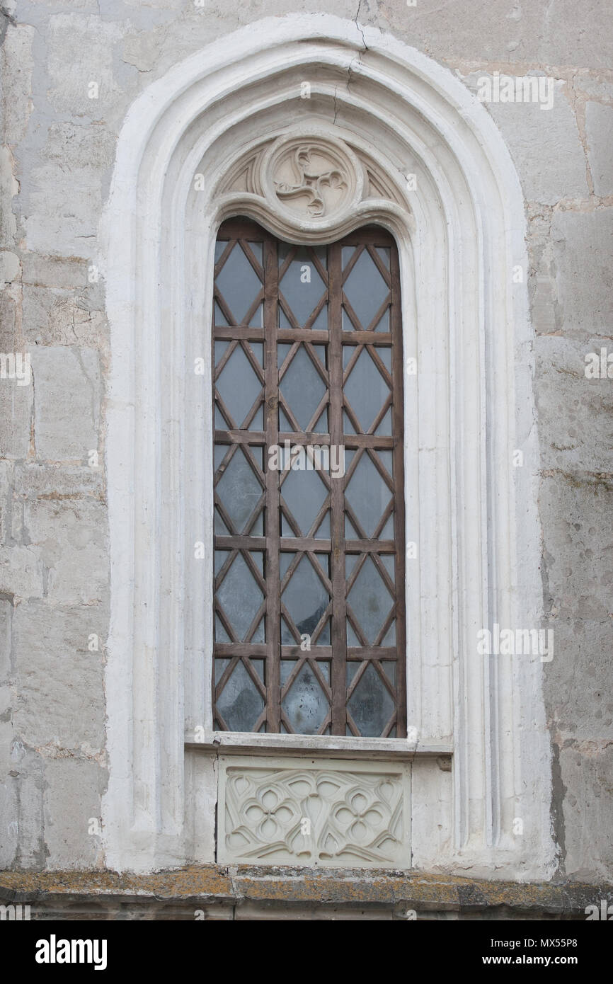 The antique window in old castle wall Stock Photo - Alamy