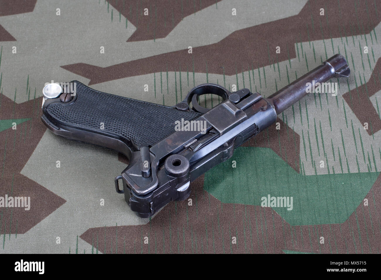 Luger P08 Parabellum handgun on camouflaged background Stock Photo - Alamy