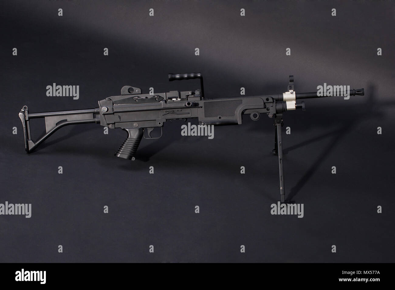m249 us army machine gun on black Stock Photo - Alamy