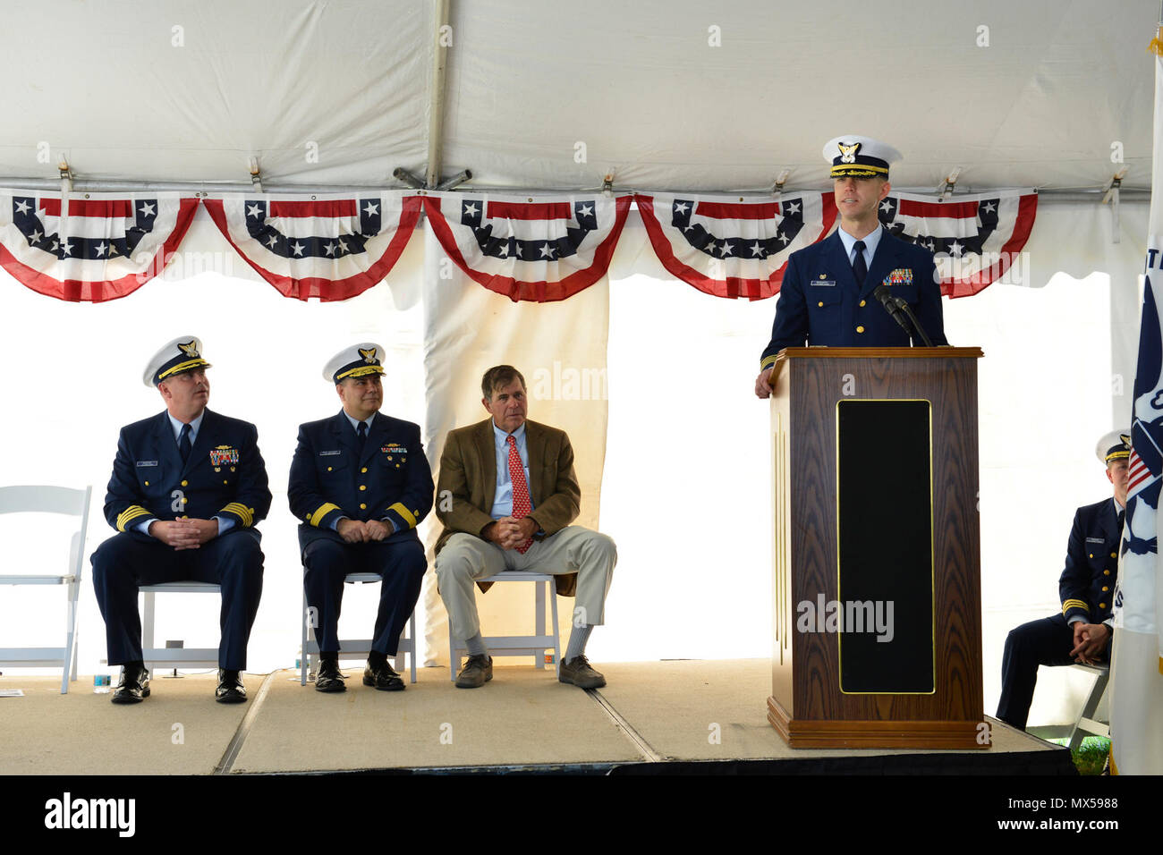 Coast Guard captain, Thomas C. Remmers, delivers his remarks during the ...