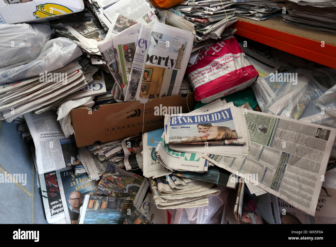 Stacks of old newspapers pictured in a cupboard in Siddlesham near ...