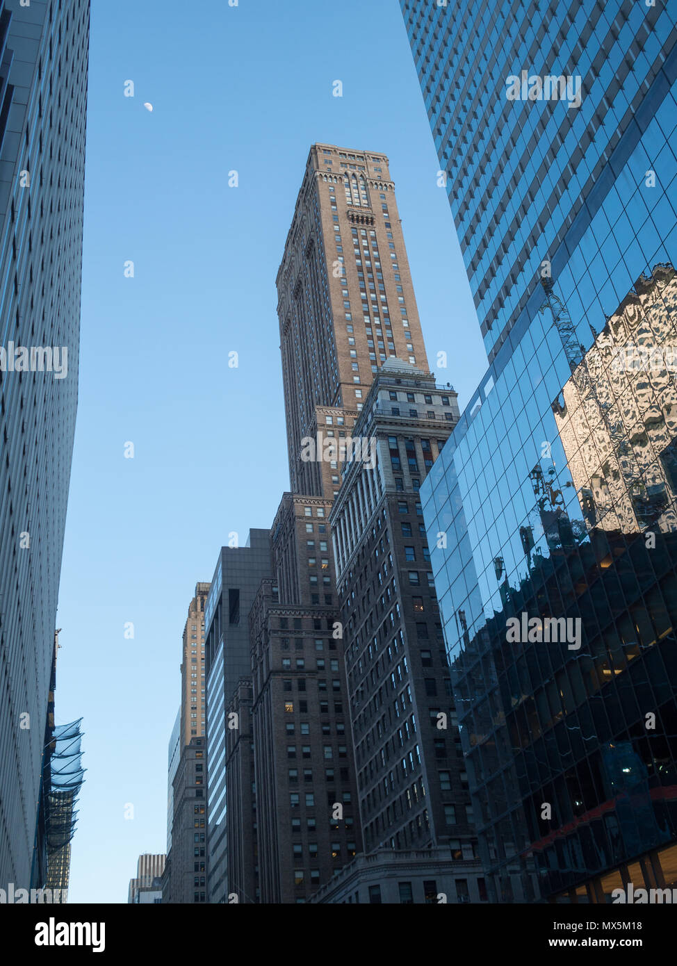 New York skyscrapers reflected in the mirrored buildings Stock Photo ...