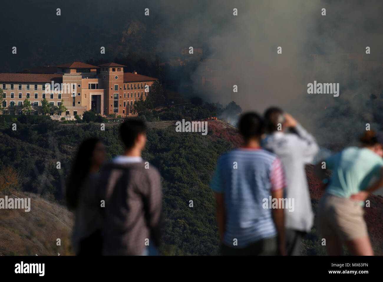 Jun 2, 2018 - Aliso Viejo, California, U.S. - Residents watch a brush ...