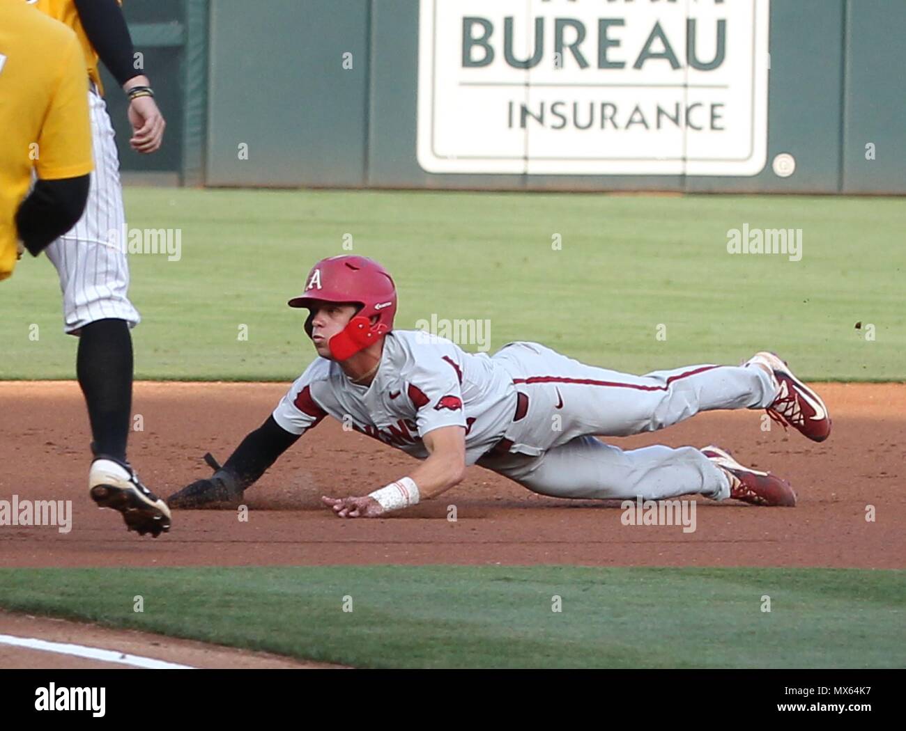 Jun 2, 2018: Arkansas baserunner Casey Martin #15 slides head first ...