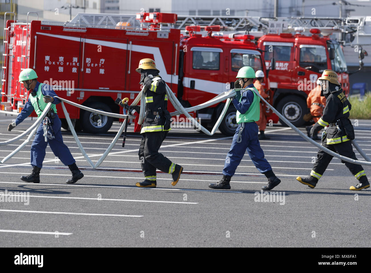 Tokyo, Japan. 3rd June, 2018. Firefighters participate in fire drills ...