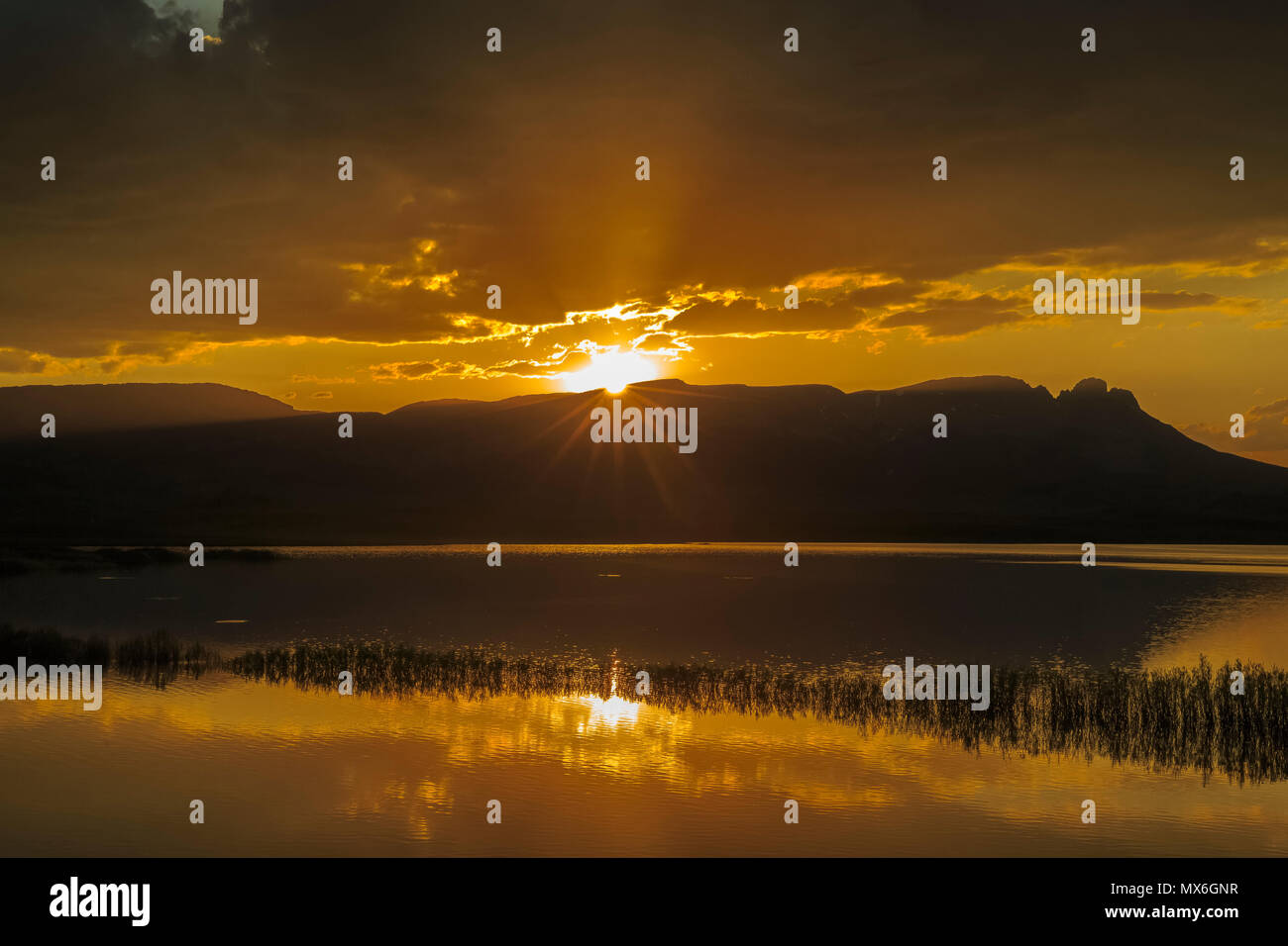 sunset over sawtooth ridge above nilan reservoir near augusta, montana ...