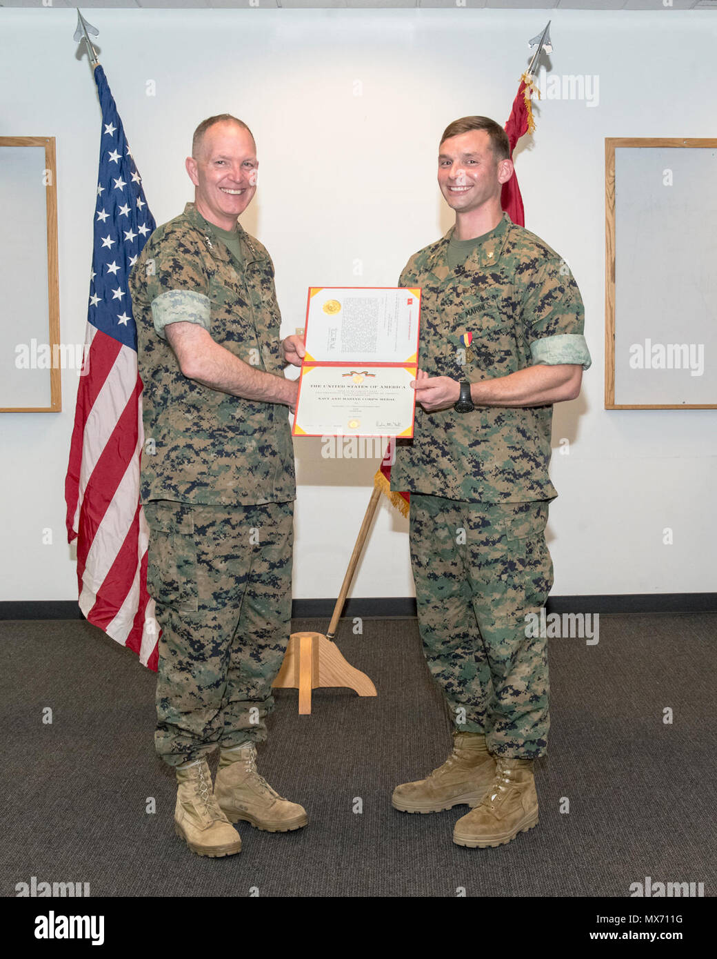 U.S. Marine Corps Maj. John Sax, right, aviation majors monitor ...