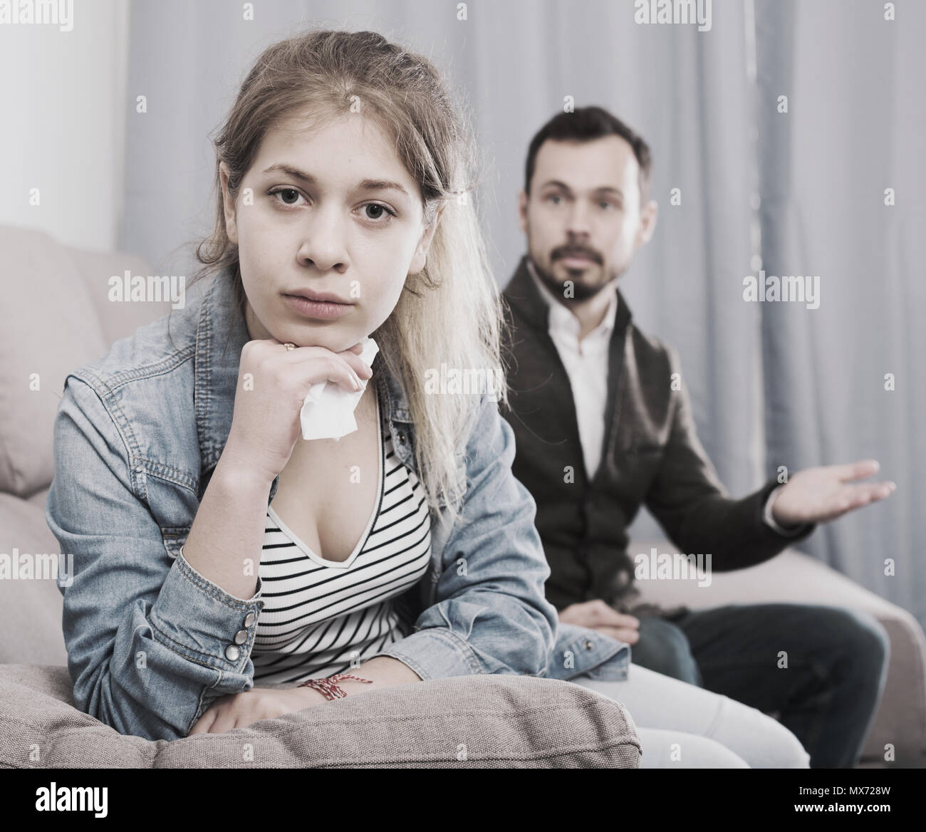 Young father having disagreement with daughter teenager at home Stock ...