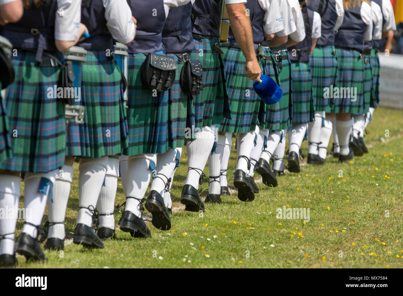 Cornhill, Scotland - 02 Jun 2018: A Pipe Band marching onto the field ...