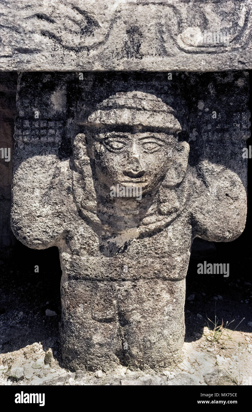 This is a close-up of one of the ancient stone statues carved by Mayans ...