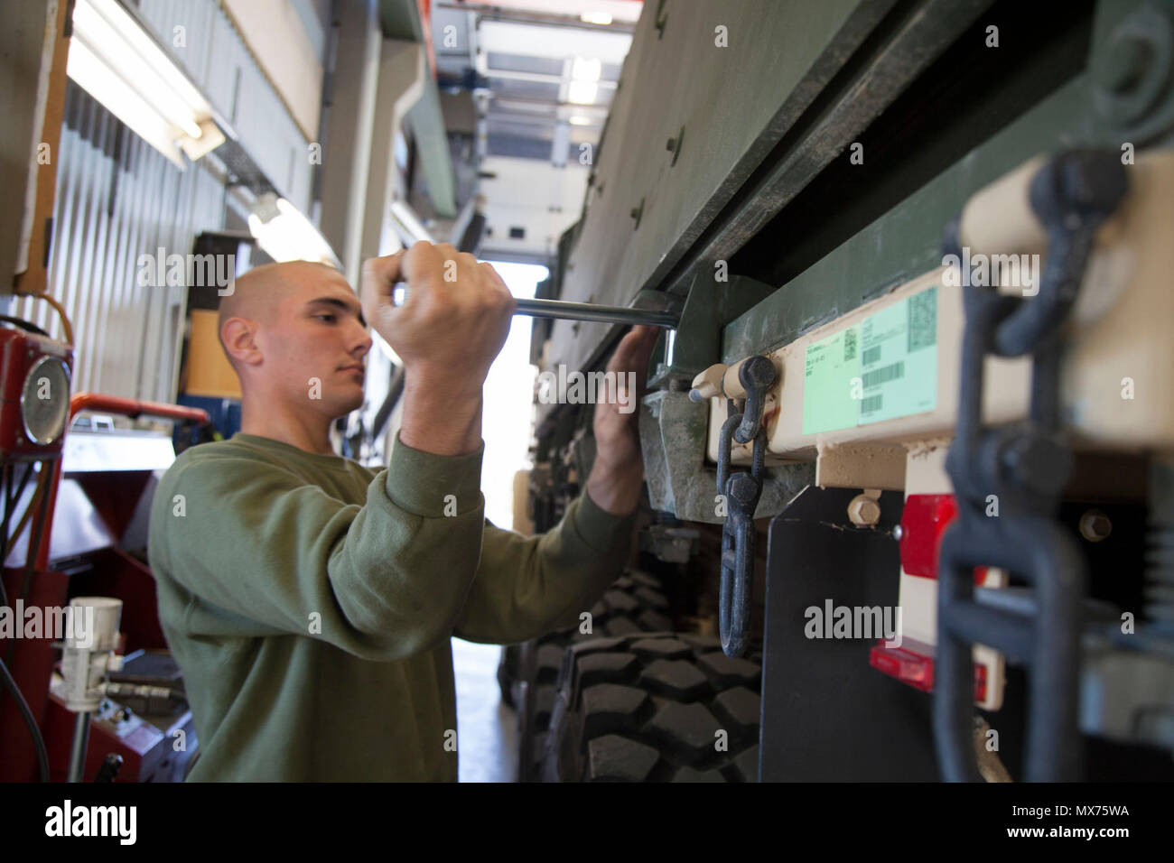 U.S. Marine Corps Cpl. Billy Garrett, a Motor Transport Mechanic with ...