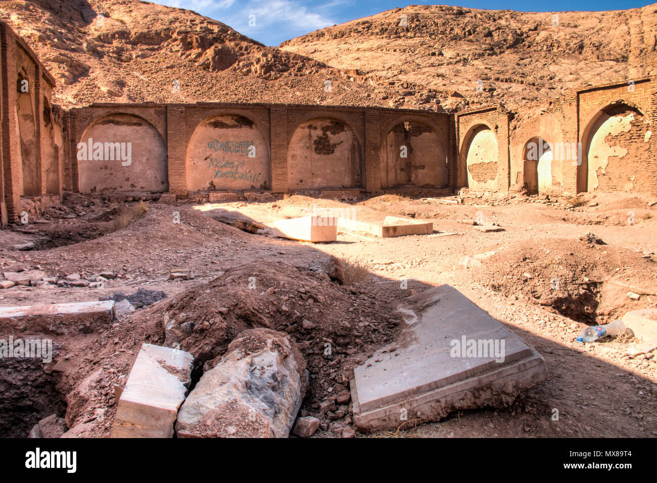 Ancient demolished Christian cemetery at the outskirts of the desert ...