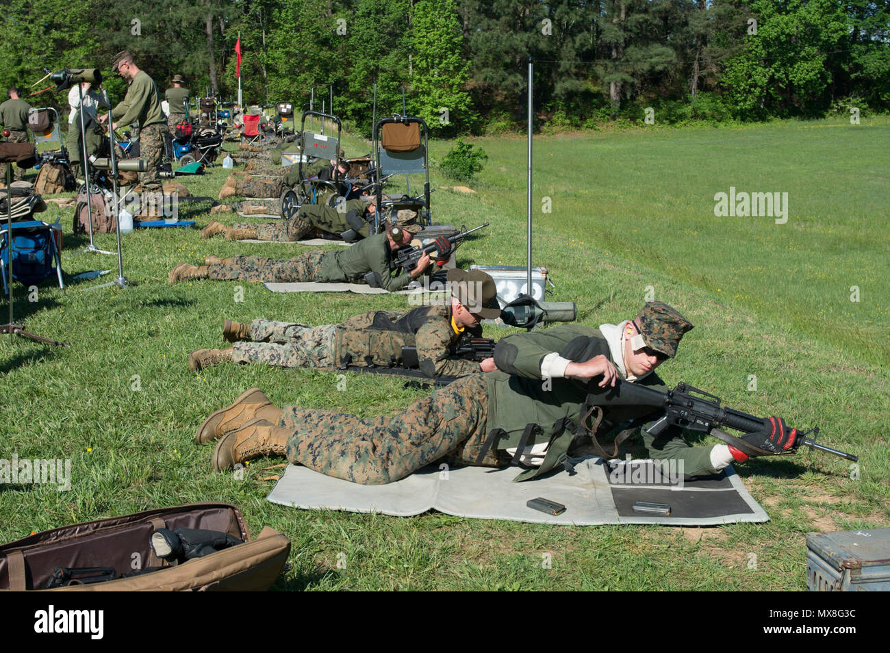 Marines prepare to fire in the prone position during the Marine Corps ...