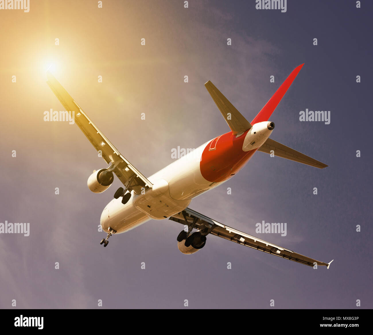 Spacious passenger airliner flying in sky towards destination Stock ...