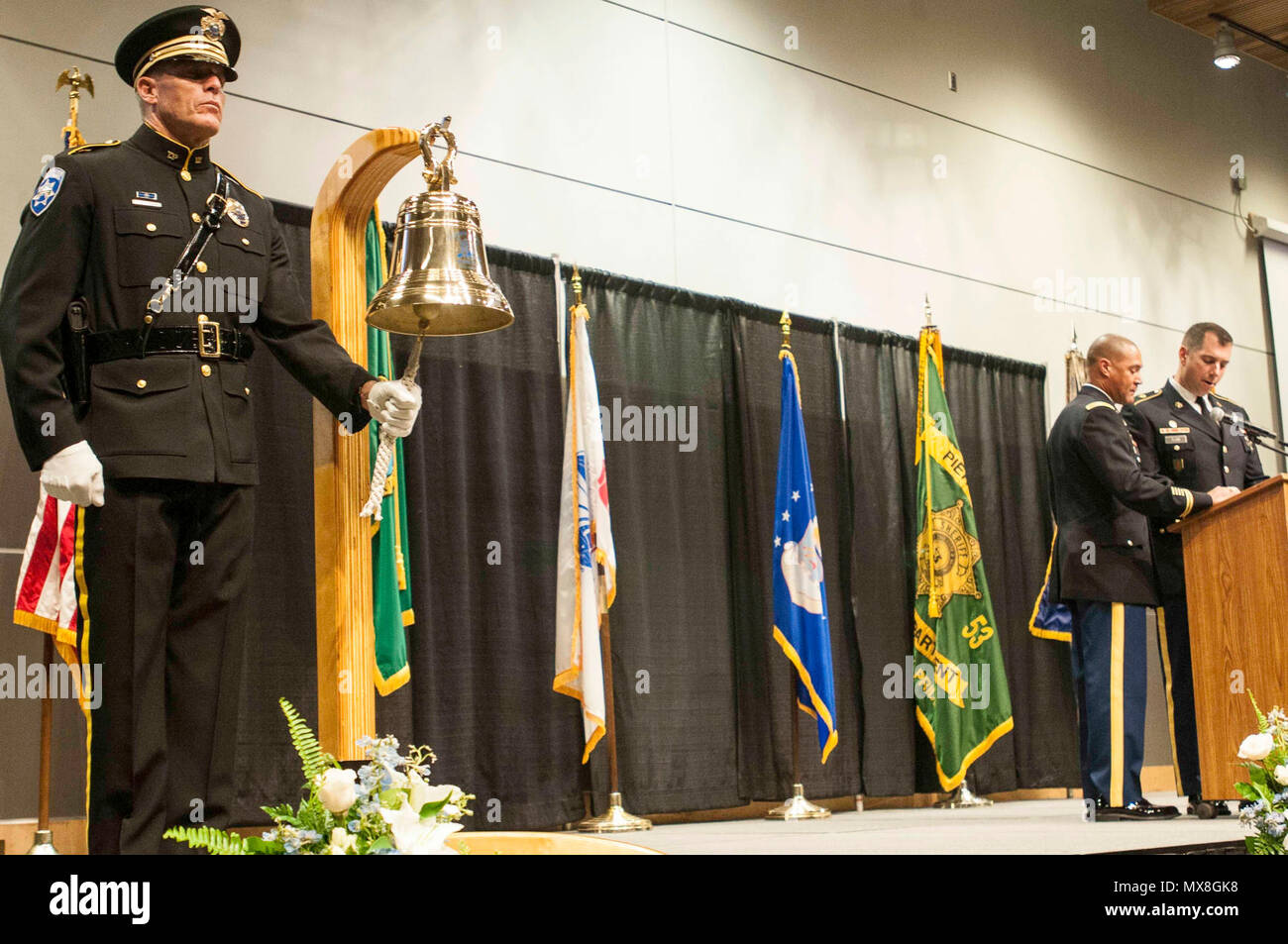 Colonel Christopher Burns (middle), commander of the 42nd Military ...