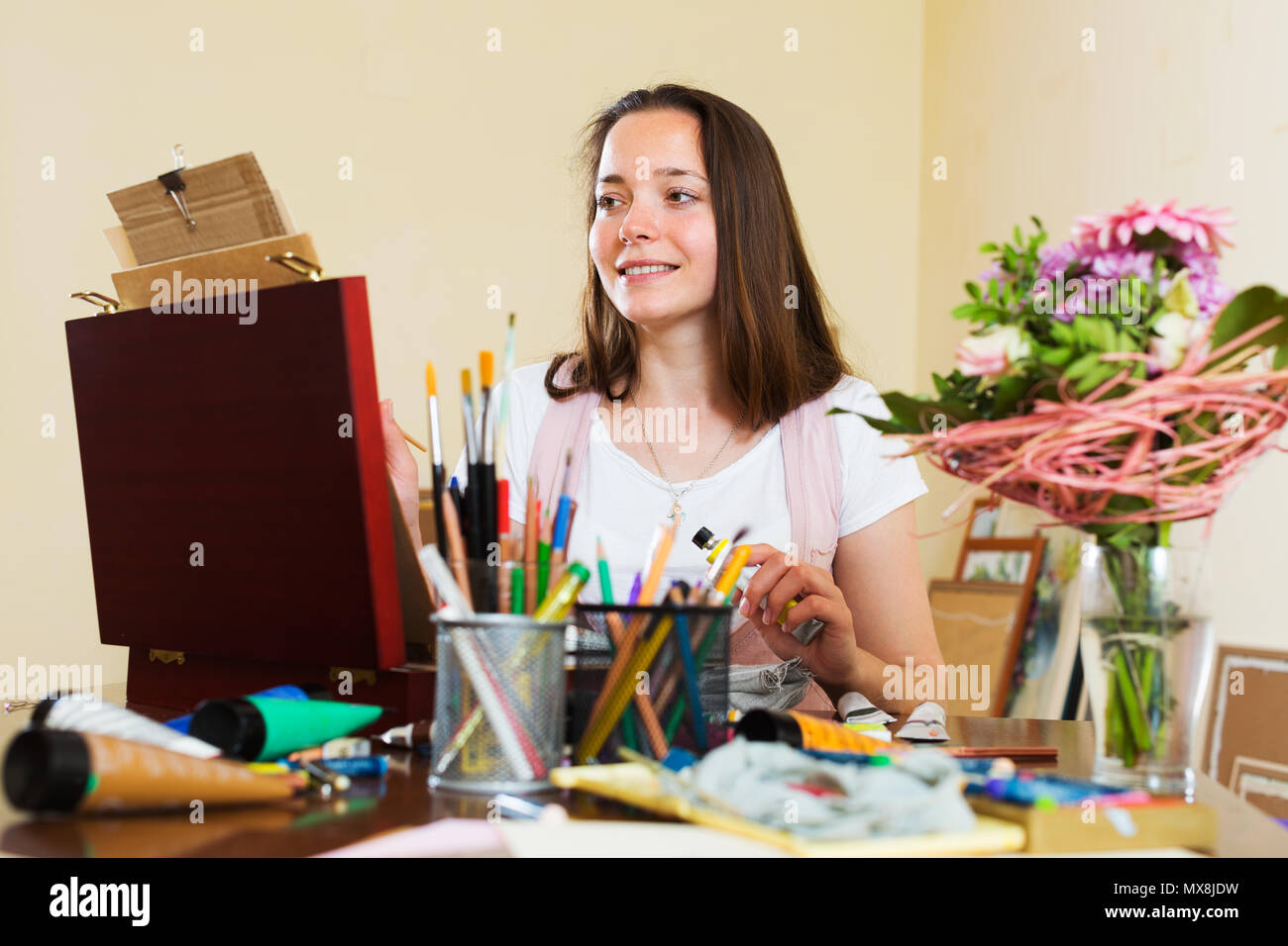 Young artist fascinated by the process of drawing a new picture Stock ...