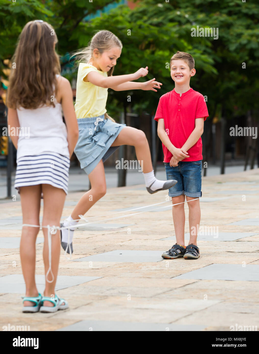 Kids playing together age 10 hi-res stock photography and images - Alamy