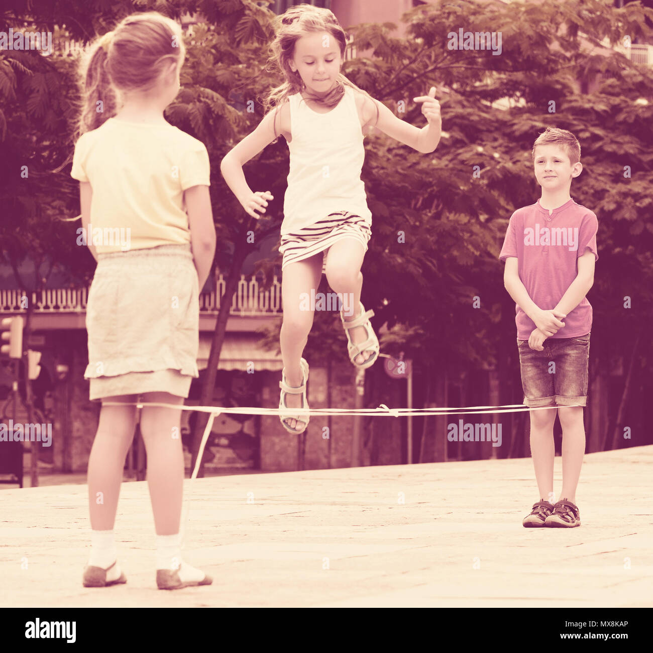 Children skipping park hi-res stock photography and images - Alamy