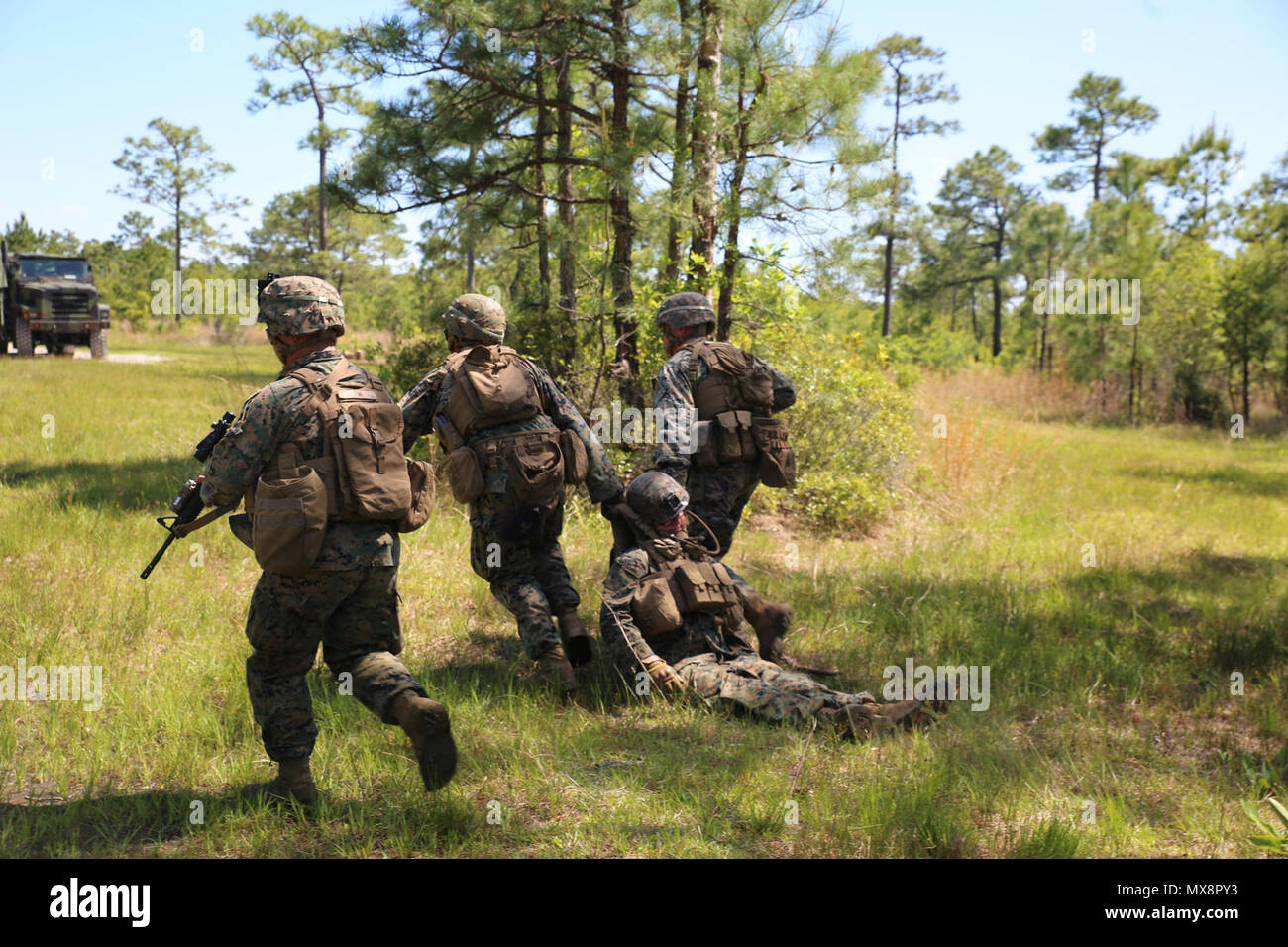 Marines evacuate a notionally injured Marine after a simulated ...