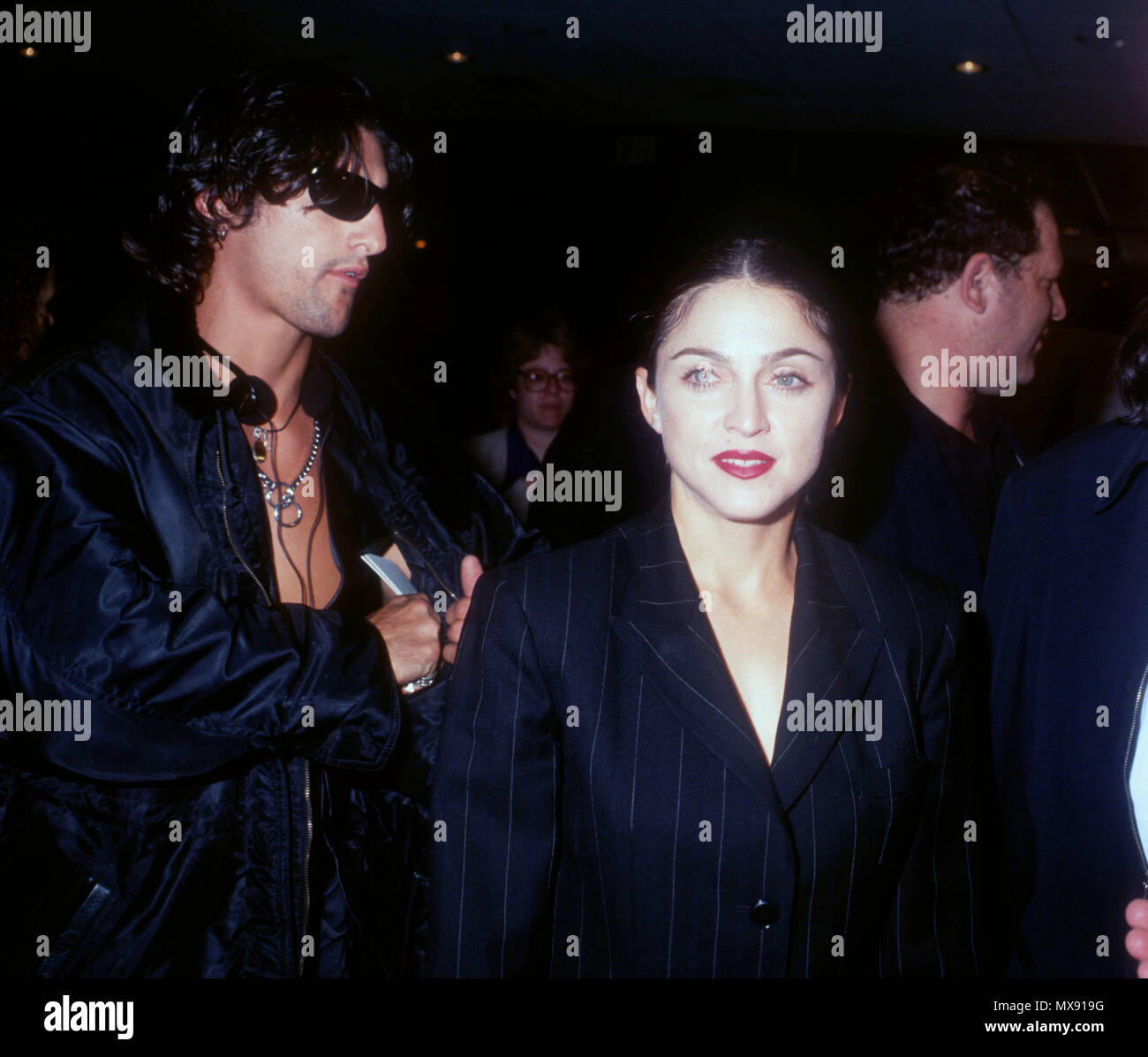 LOS ANGELES, CA - AUGUST 7: (L-R) Model Tony Ward, singer Madonna and ...