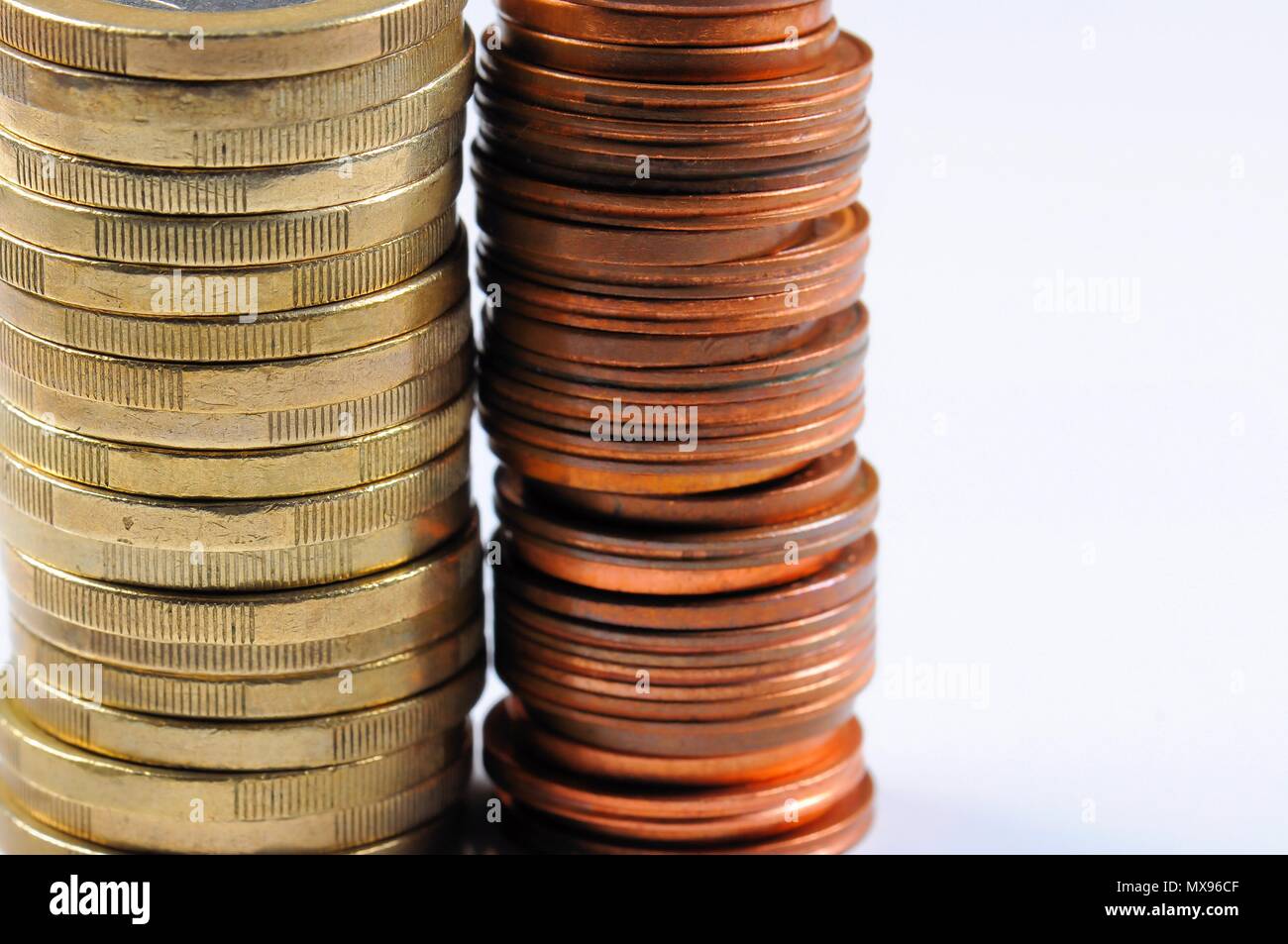 pile of coins of euro and cents of euro on white background Stock Photo ...