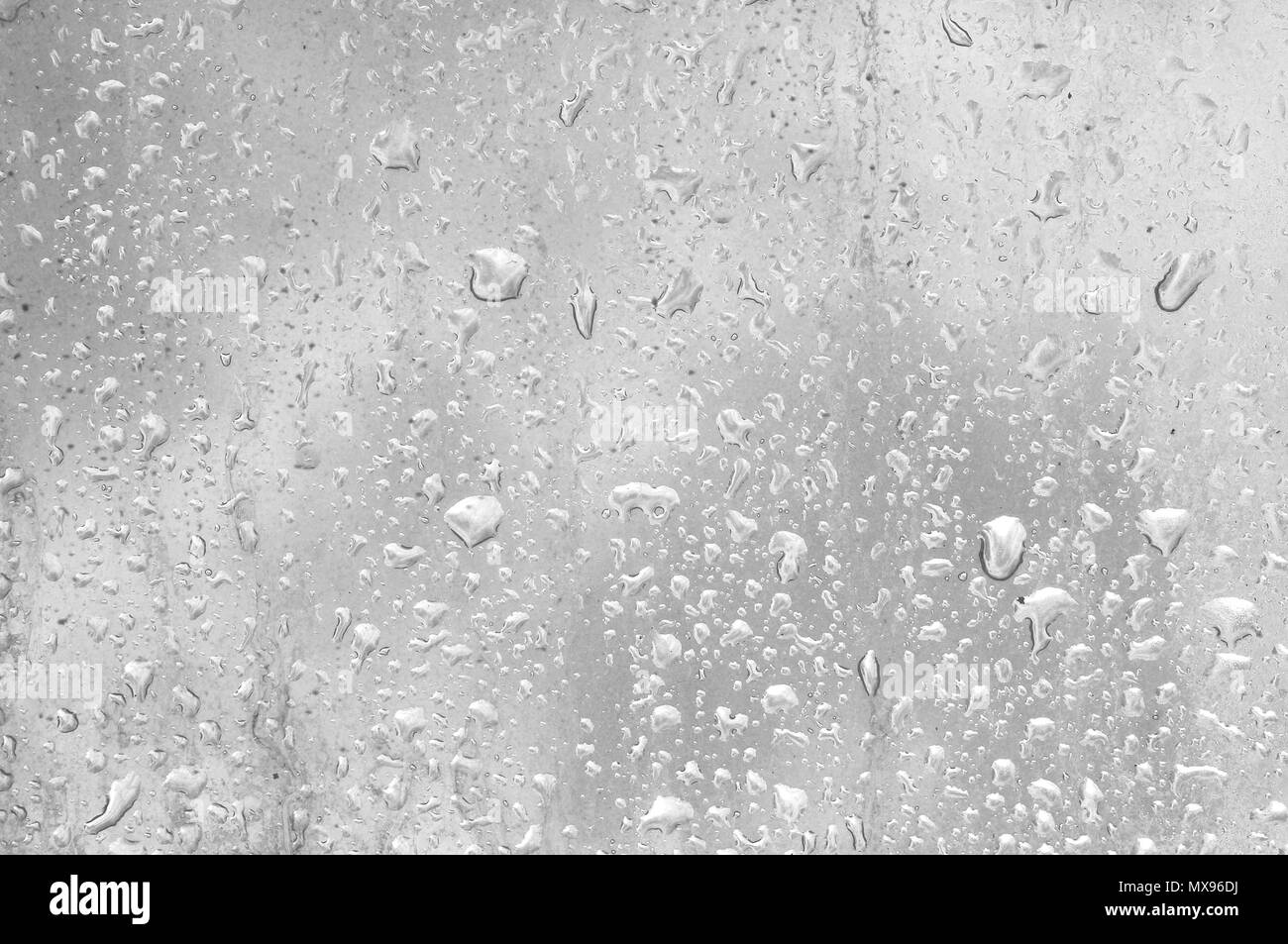 Drops of rain on transparent glass background Stock Photo - Alamy