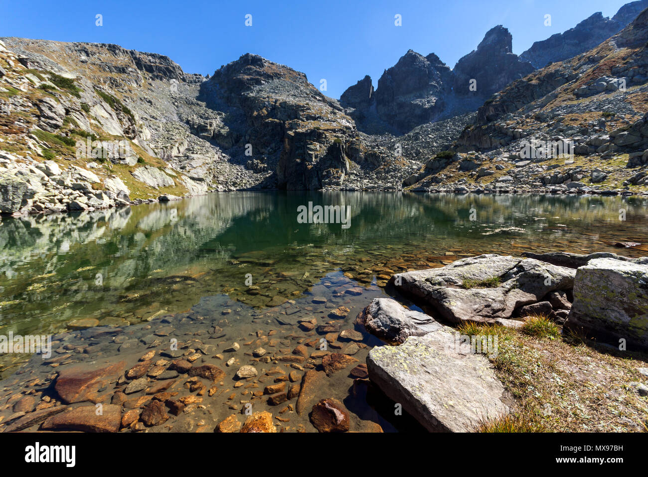 The Scary lake and Kupens peaks, Rila Mountain, Bulgaria Stock Photo ...