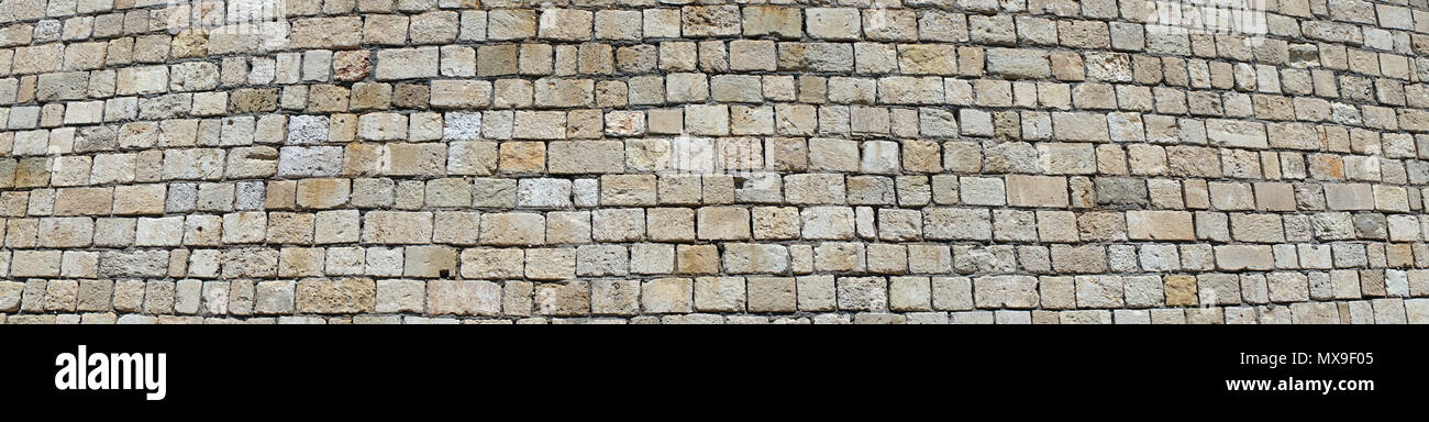 Very long stone wall Stock Photo - Alamy
