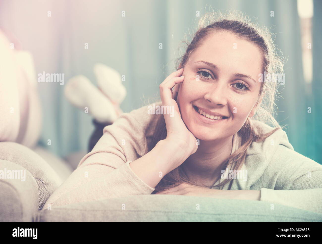 Smiling girl using various poses having good time in leisure time Stock ...
