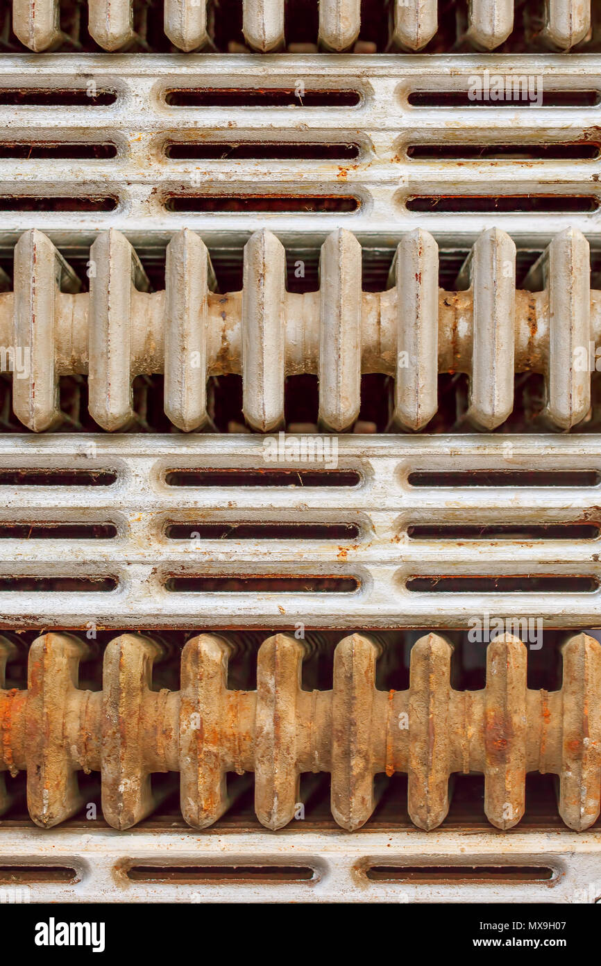 Stacked discarded cast-iron radiators Stock Photo - Alamy