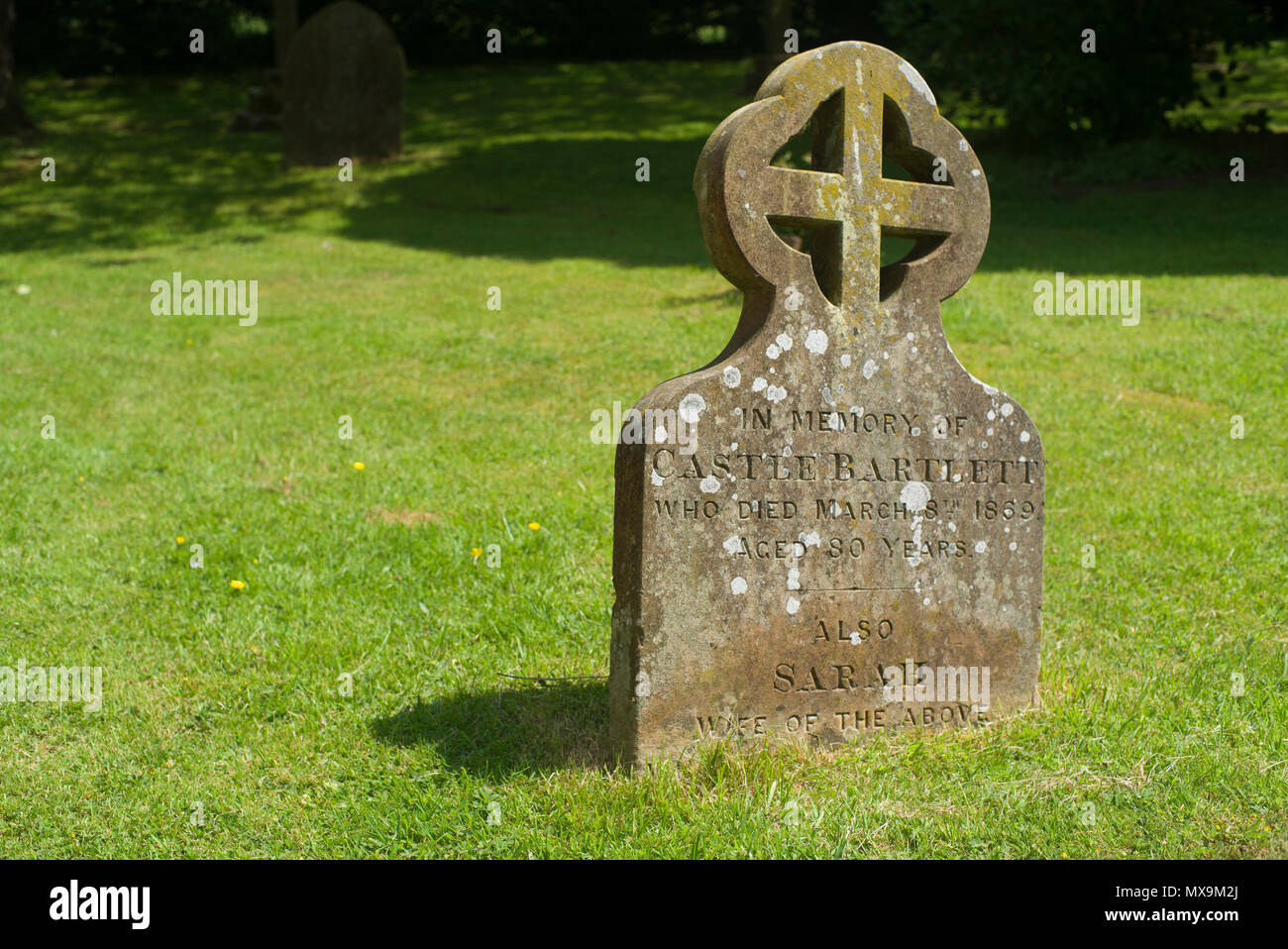 Old gravestone in a churchyard Stock Photo - Alamy