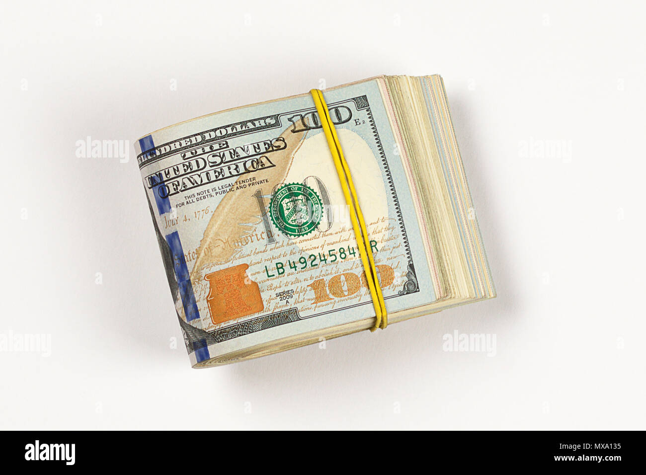 100 dollar bill roll isolated on white background Stock Photo - Alamy