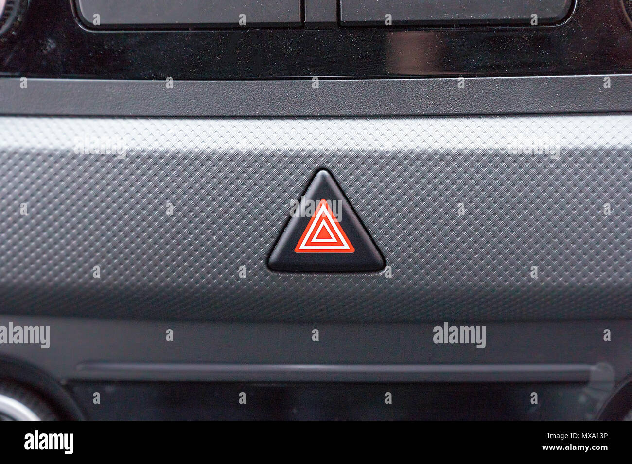 Emergency button on the car panel. Alarm button in the car Stock Photo ...