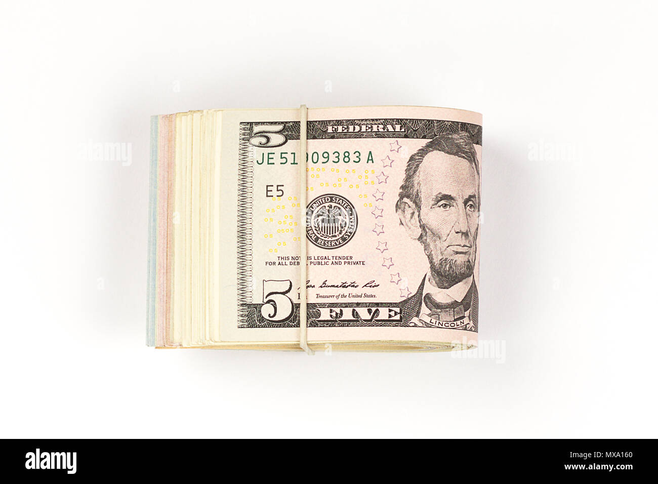 Stack of USA 5 dollars isolated on white background Stock Photo - Alamy