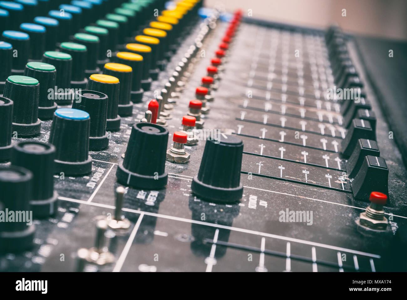 Old analog mixing console. Faders, buttons and sliders Stock Photo - Alamy
