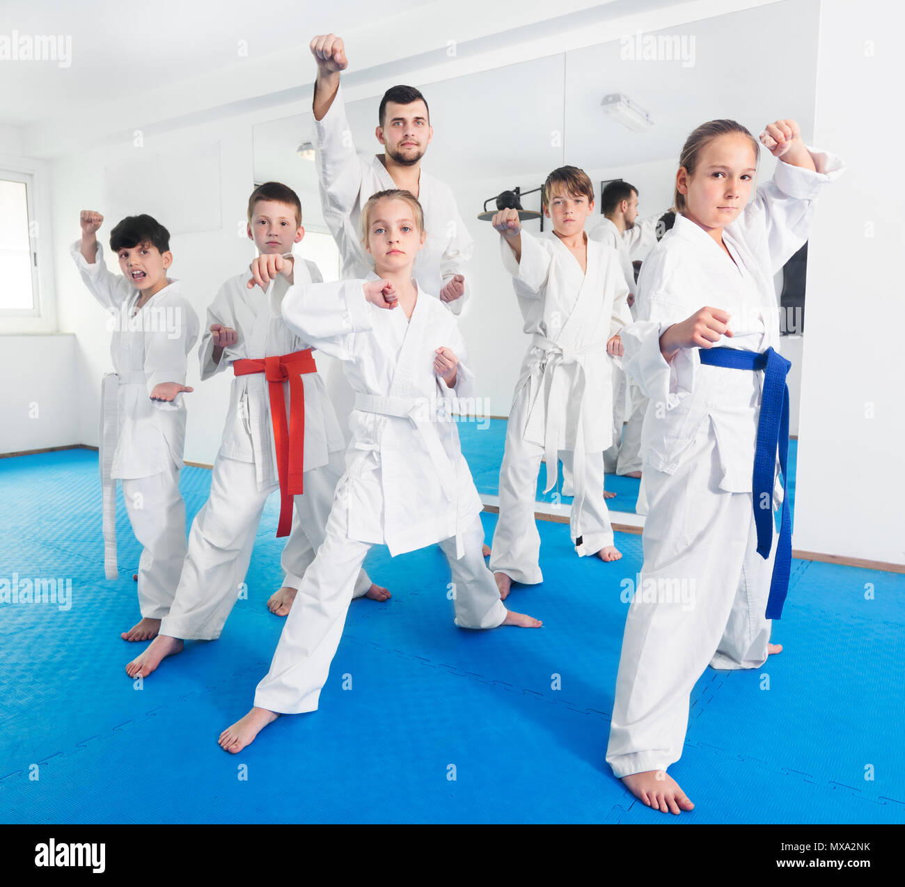Young teenagers happy to attend a karate class on self-defense Stock ...
