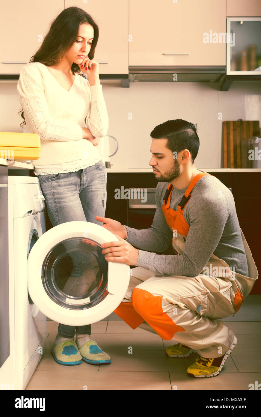 Broken washing machine kitchen hi-res stock photography and images - Alamy