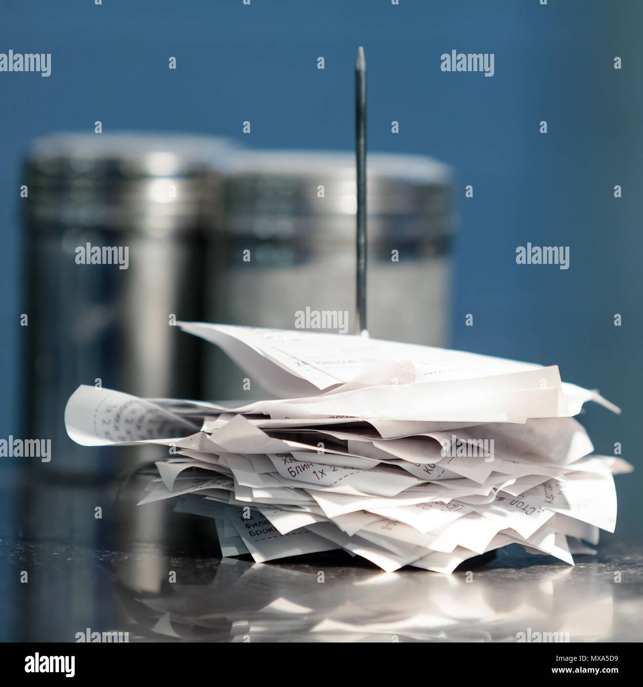 Receipts on paper spike hi-res stock photography and images - Alamy
