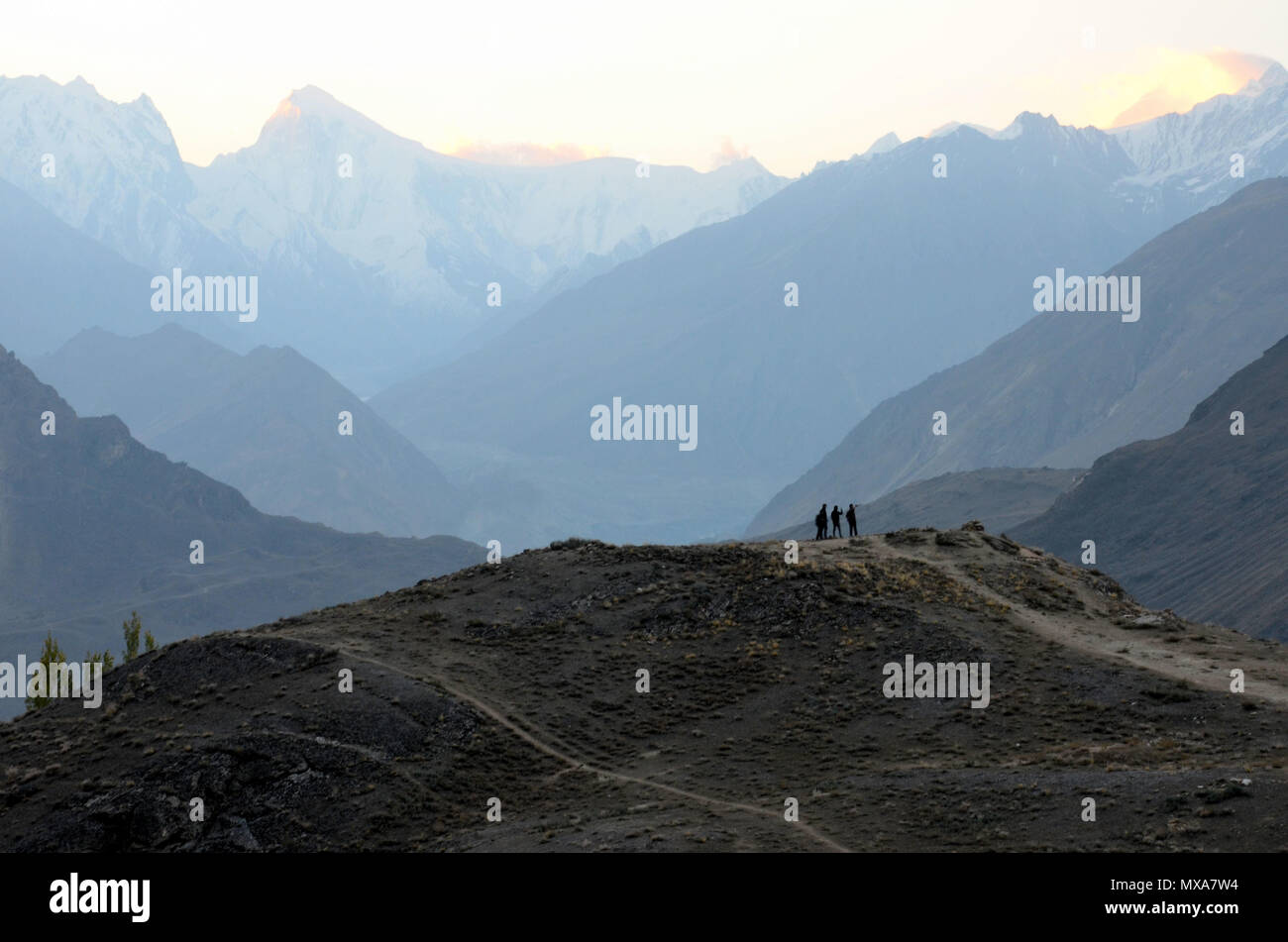 Snow capped mountains in Hunza Valley at sunrise Gilgit-Baltistan ...
