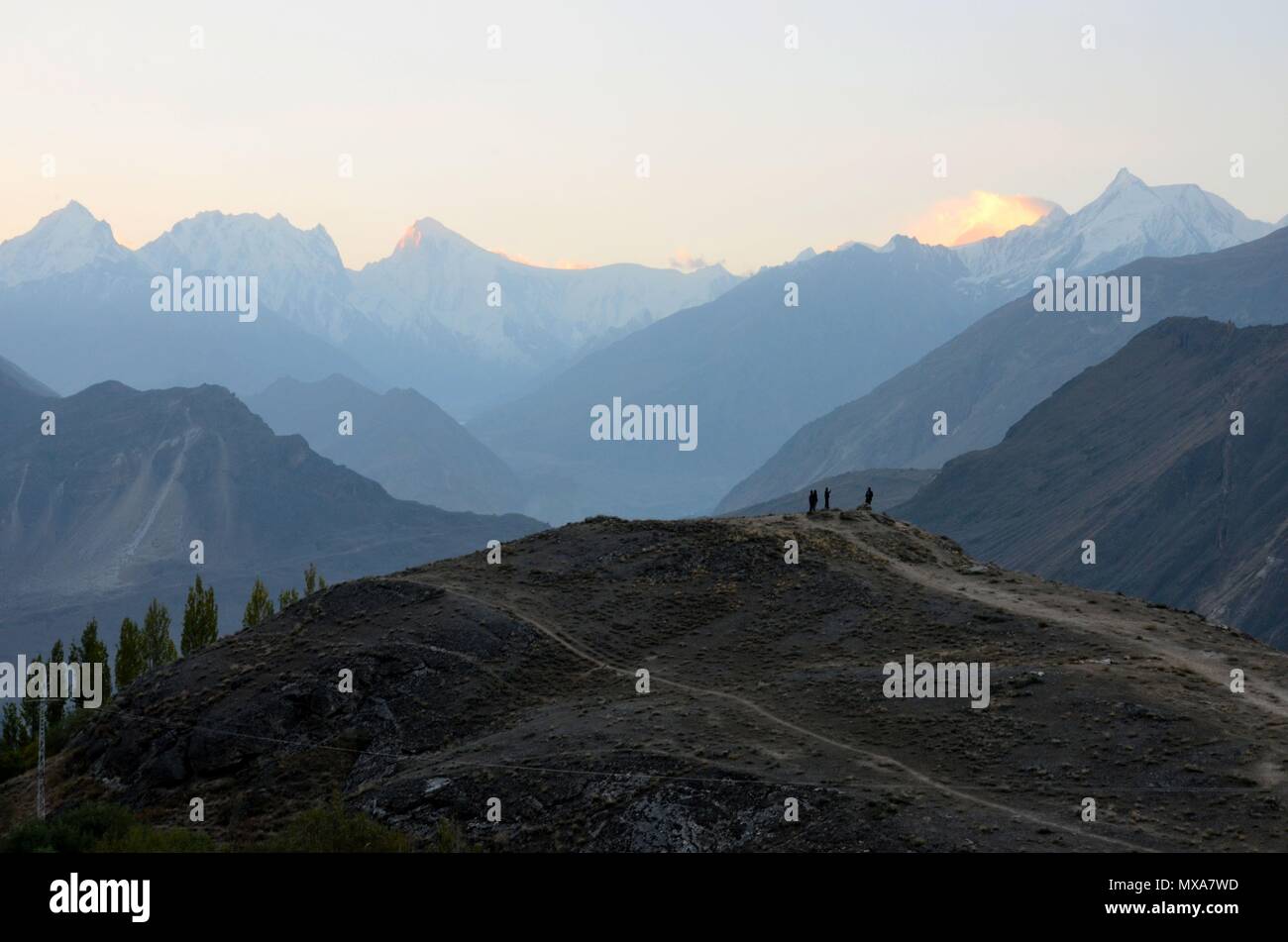 Snow capped mountains in Hunza Valley at sunrise Gilgit-Baltistan ...