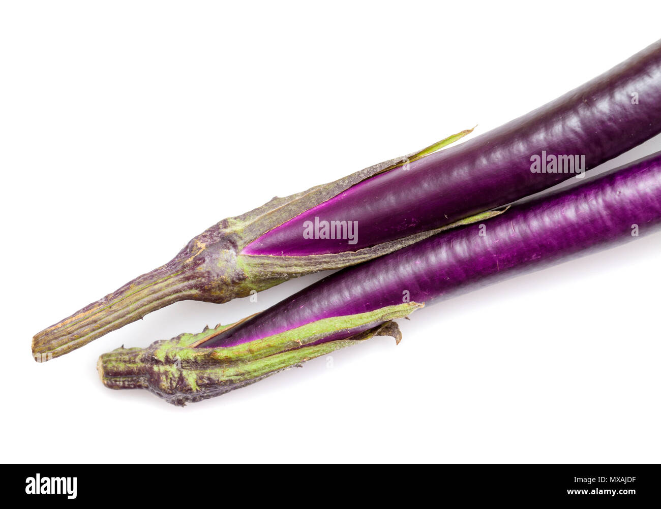 eggplant, long cultivar from Asia, stem close-up, isolated on white ...