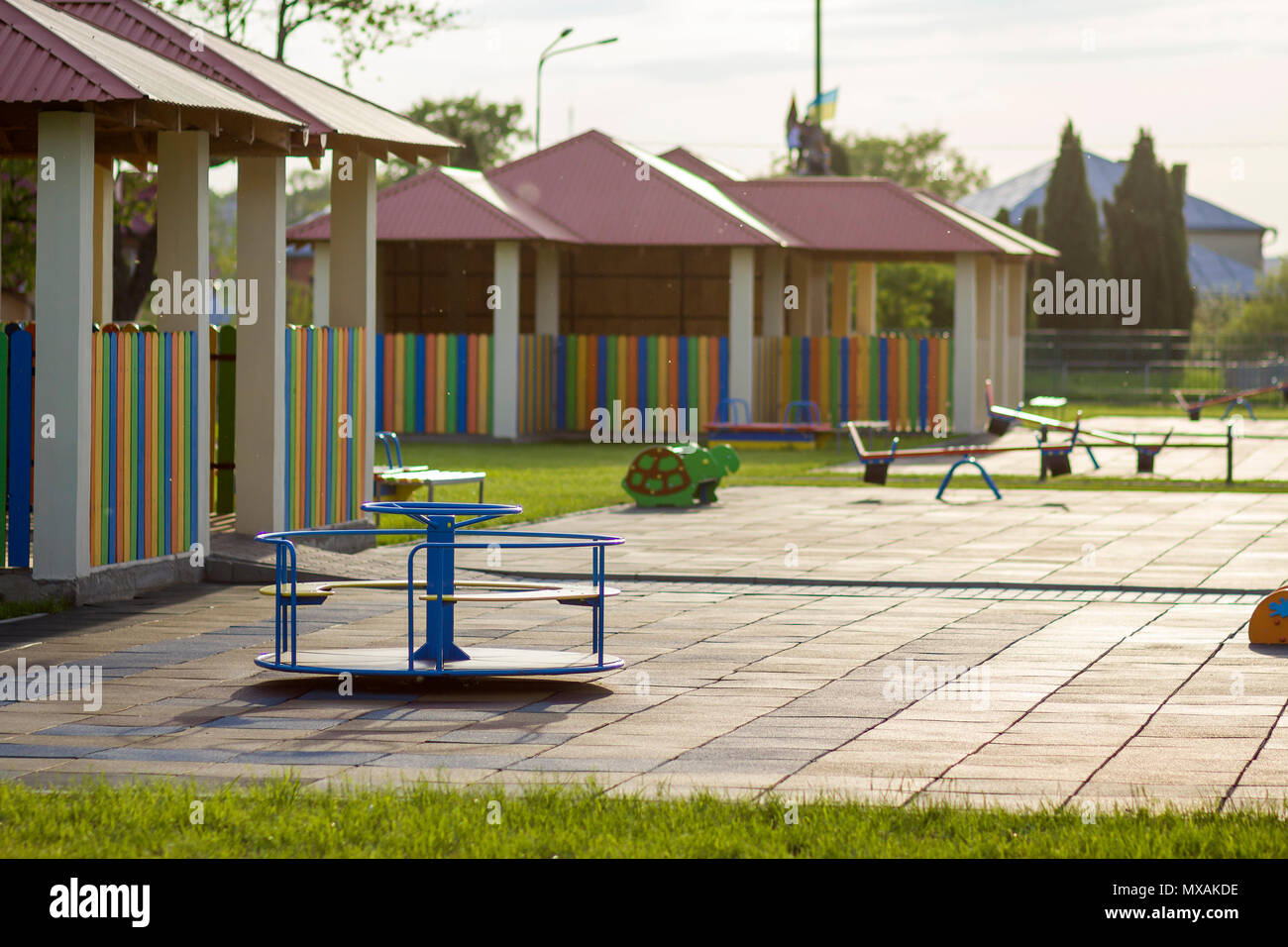 Beautiful new modern playground in kindergarten with soft pavement ...