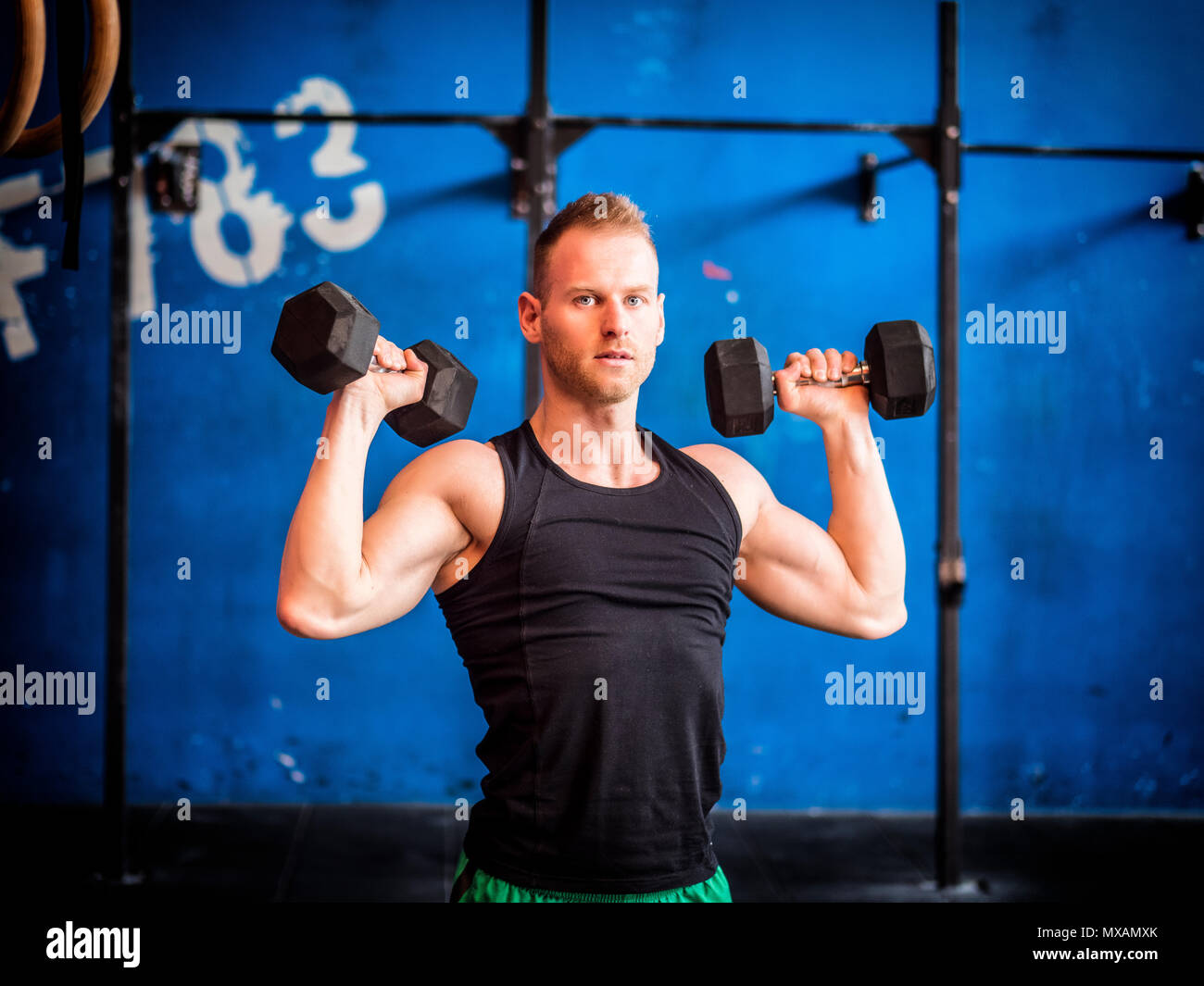 Athletic young man lifting hi-res stock photography and images - Alamy