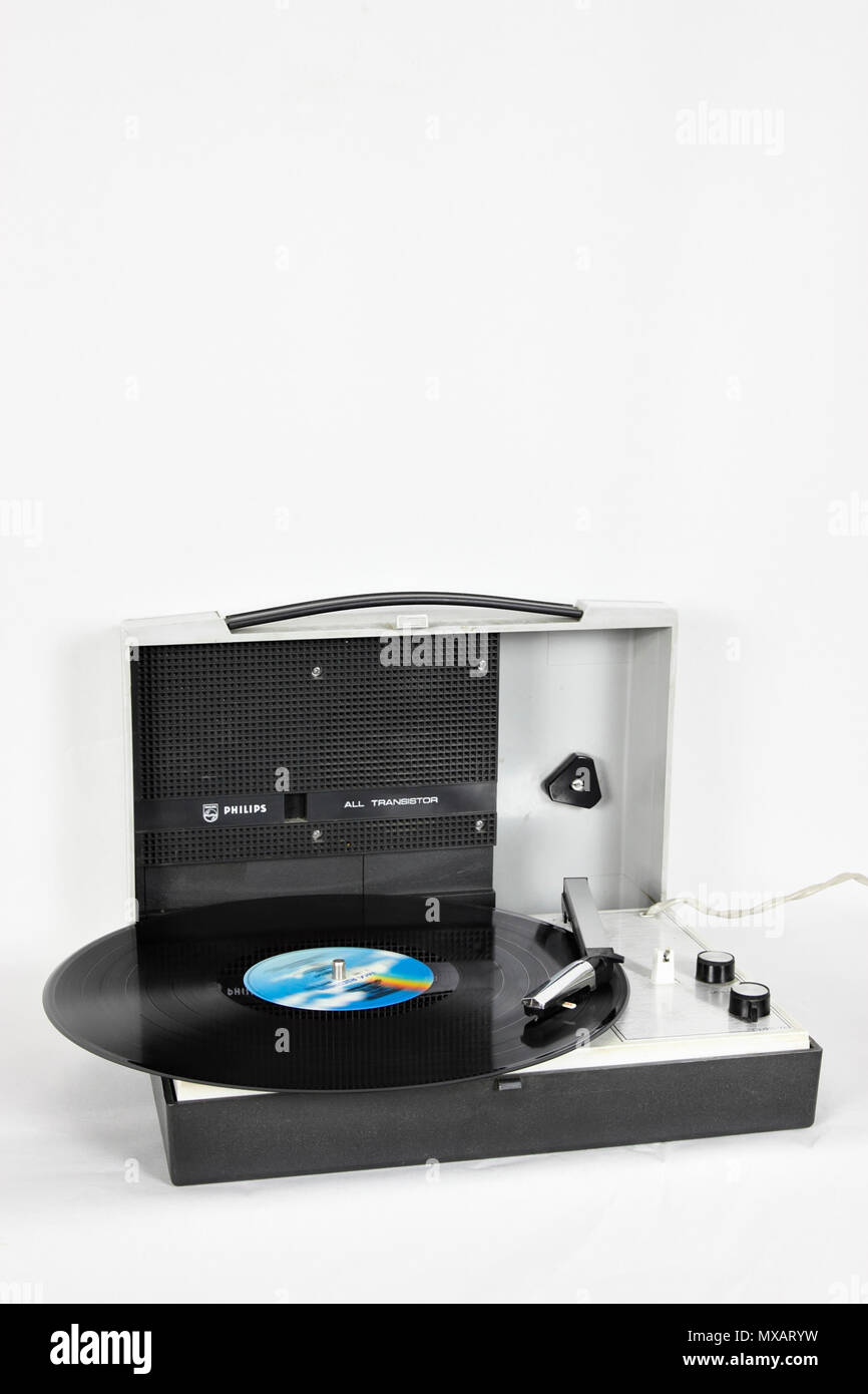 record player with spinning disc on white background Stock Photo - Alamy