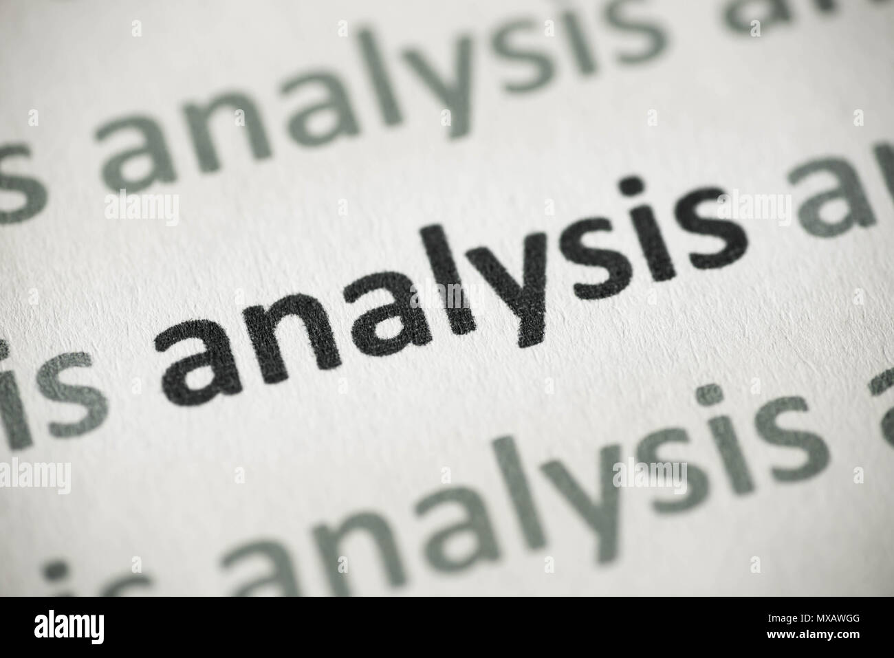word analysis printed on white paper macro Stock Photo - Alamy