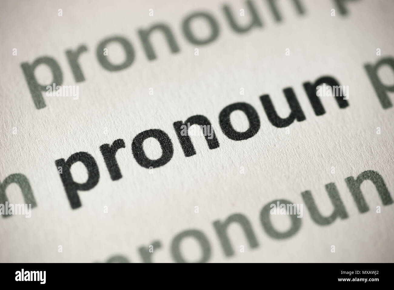 word pronoun printed on white paper macro Stock Photo - Alamy